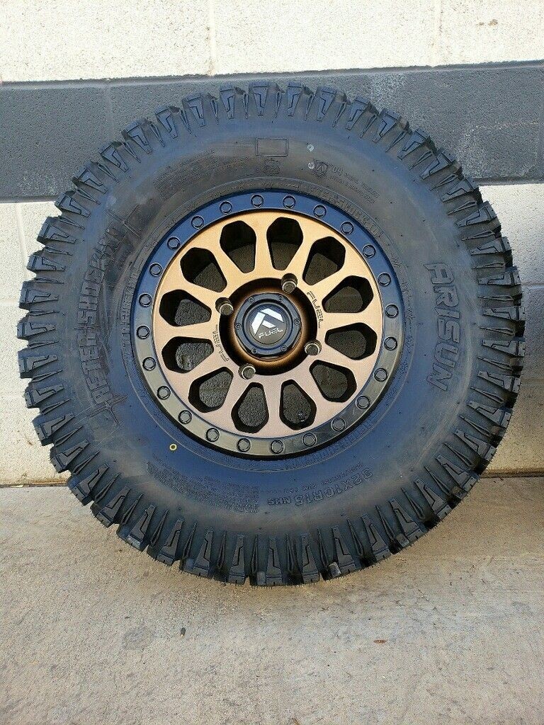 Fuel 15X7 4x137 5+2 Bronze Wheels & 33x9.5-15 Arisun Aftershock XD ...