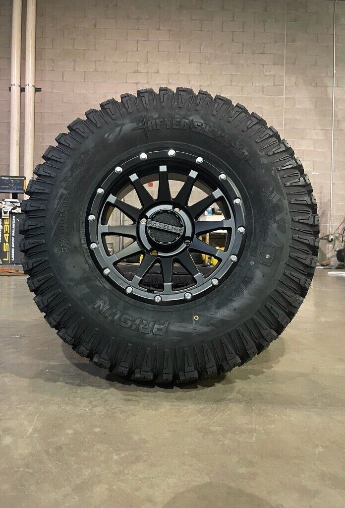 Raceline 15x6 4x156 Black Wheels & 32x10-15 Arisun Aftershock XD Tires ...
