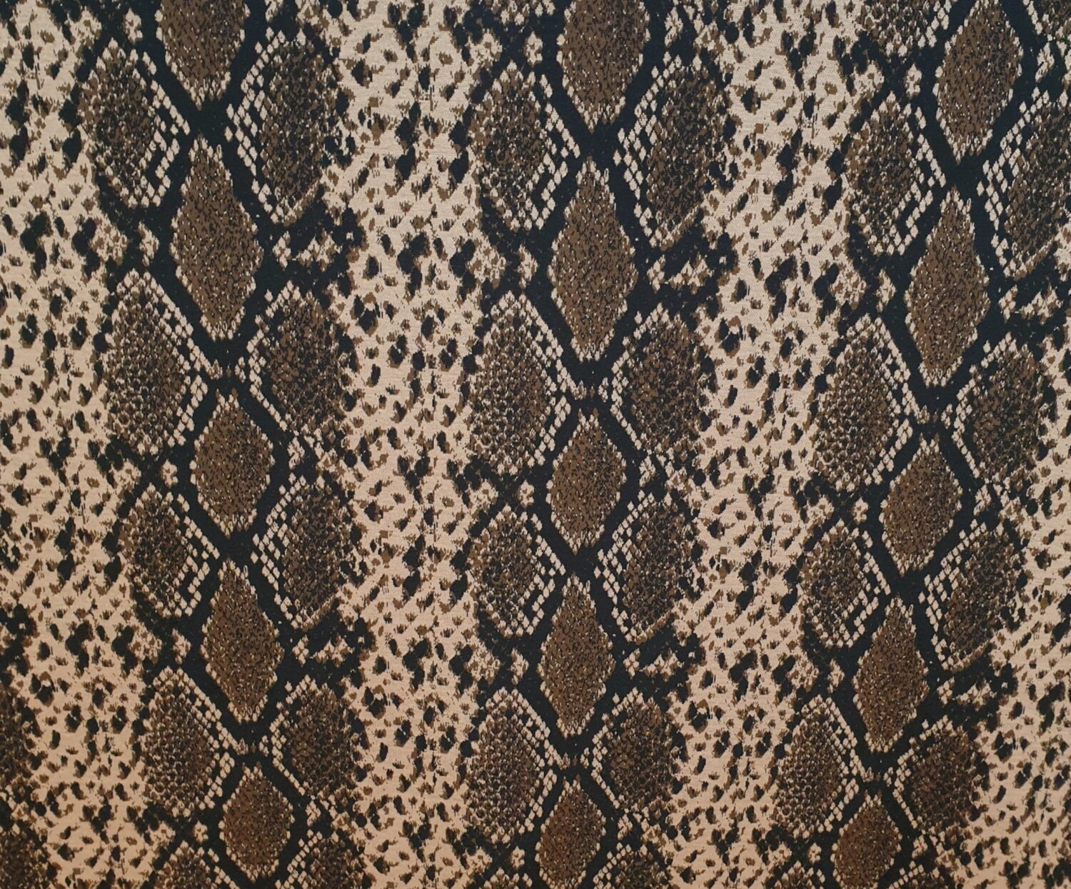 Snake jacquard jersey fabric.