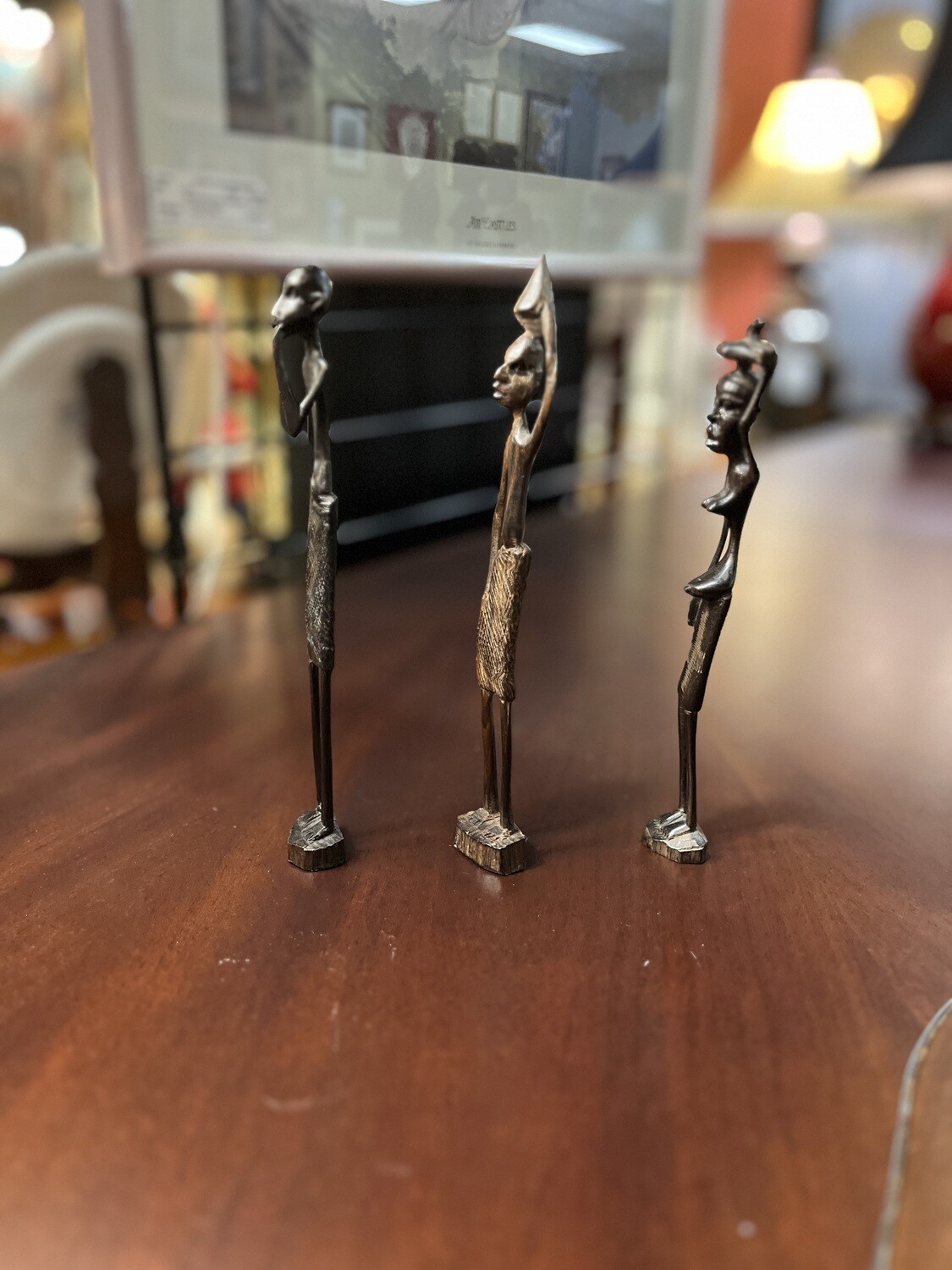 Three Carved African Stick Figures