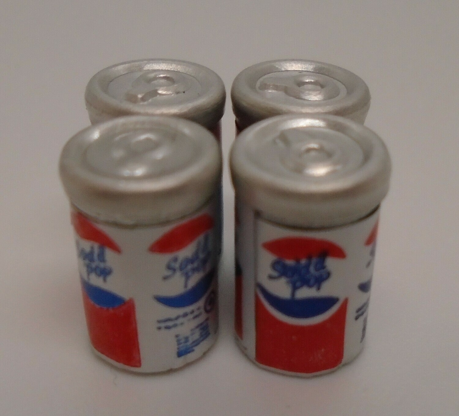 4 CANS OF POP/SODA