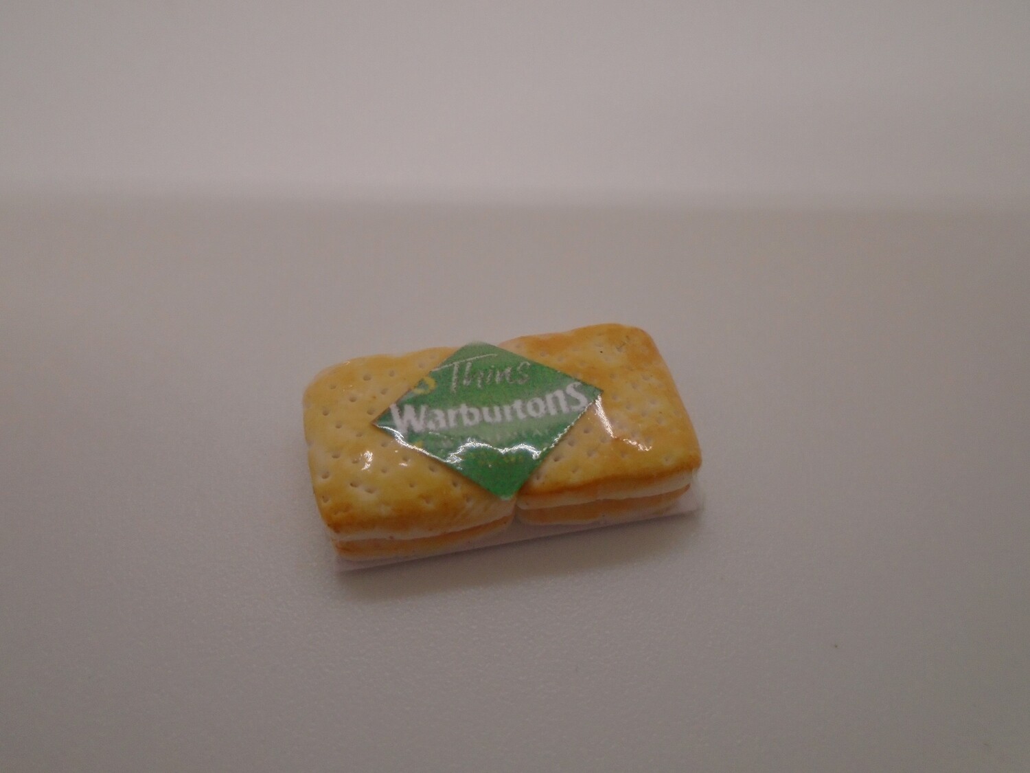 WARBURTON THINS IN PACKET