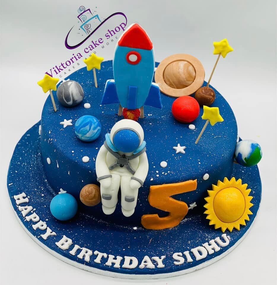 Galaxy Theme Cake Planets and Astronaut Fondant