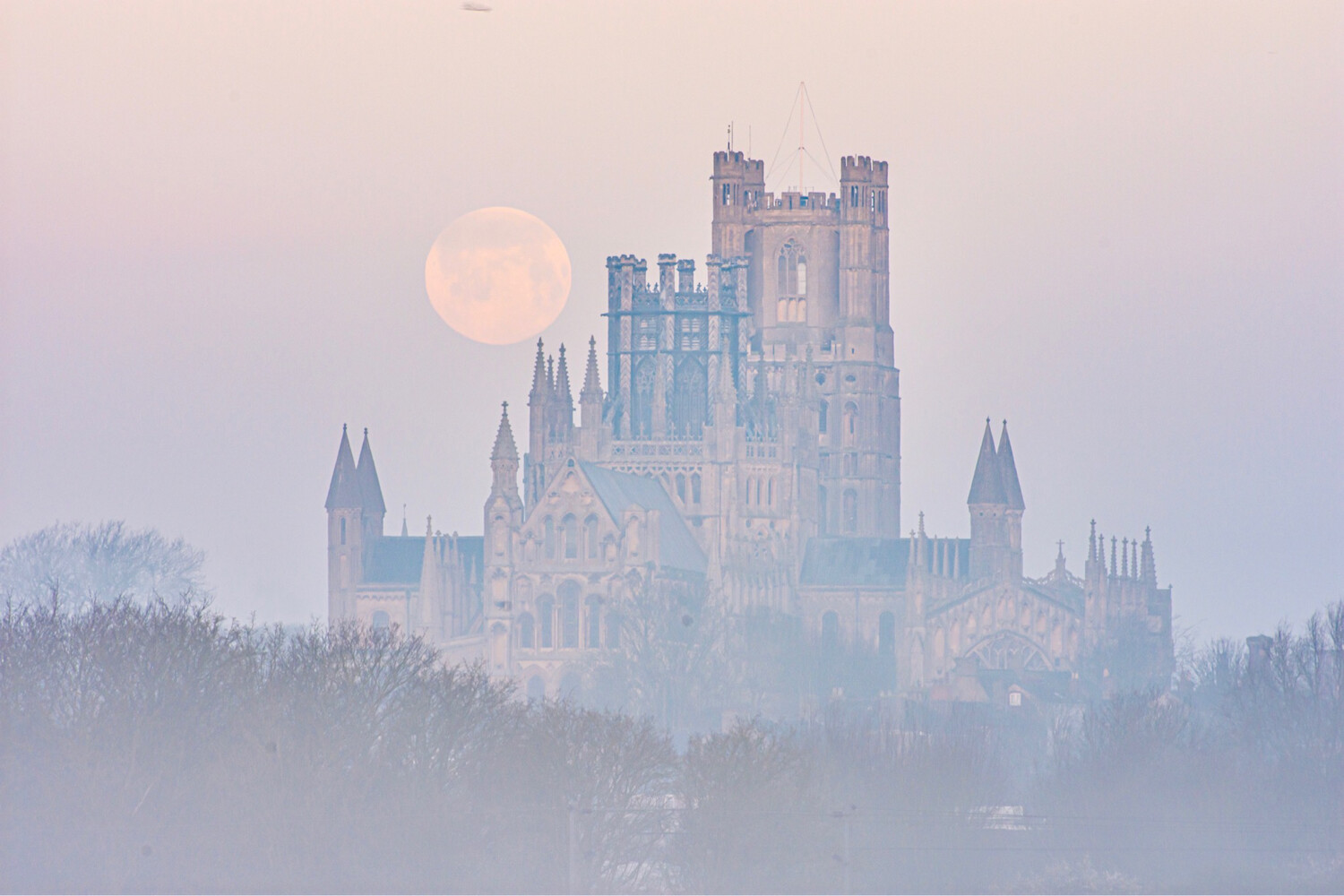 Ely Cathedral With A Misty Full Moon