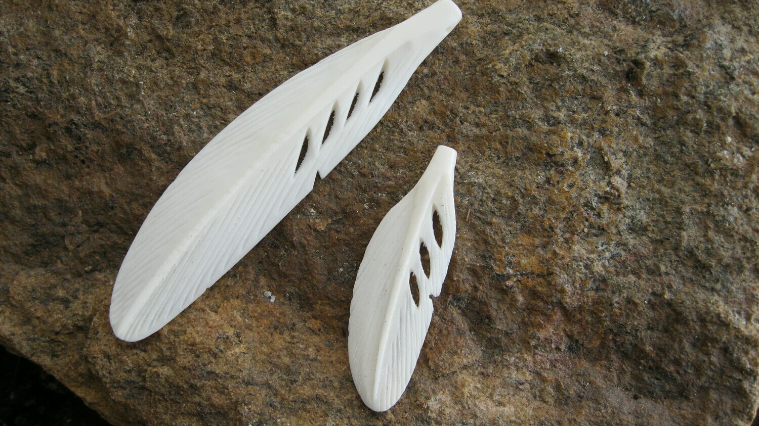 Bone carved feather pendant 1 pc.