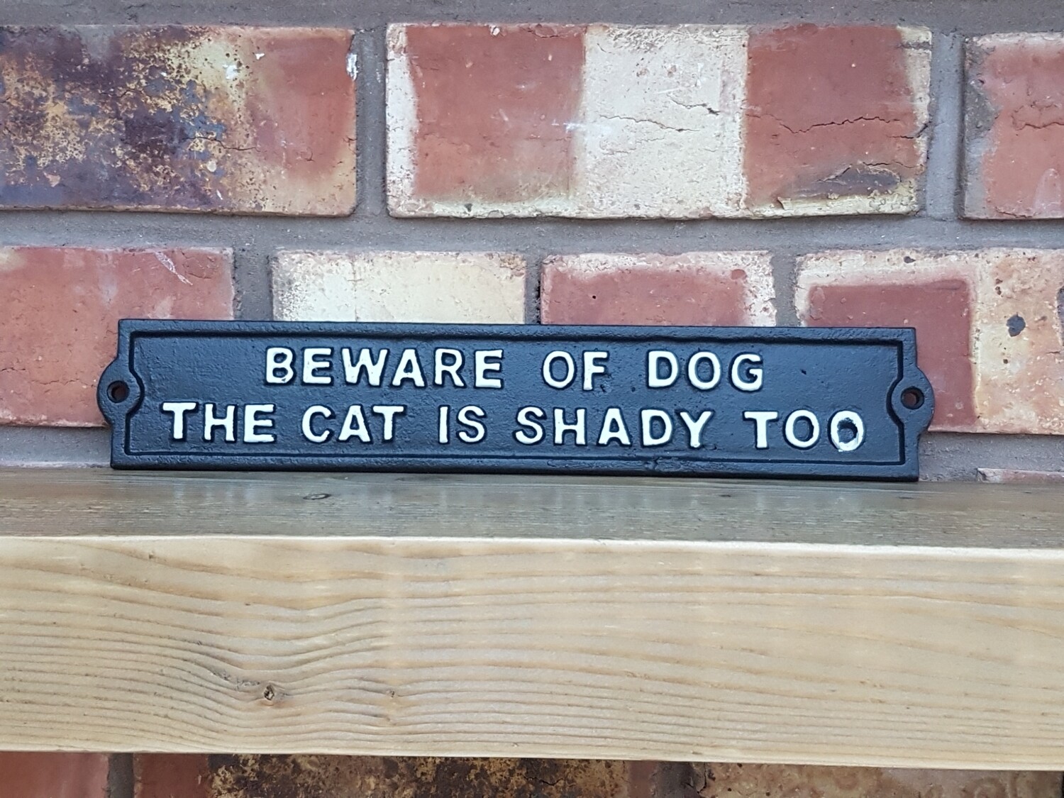 Cast iron sign