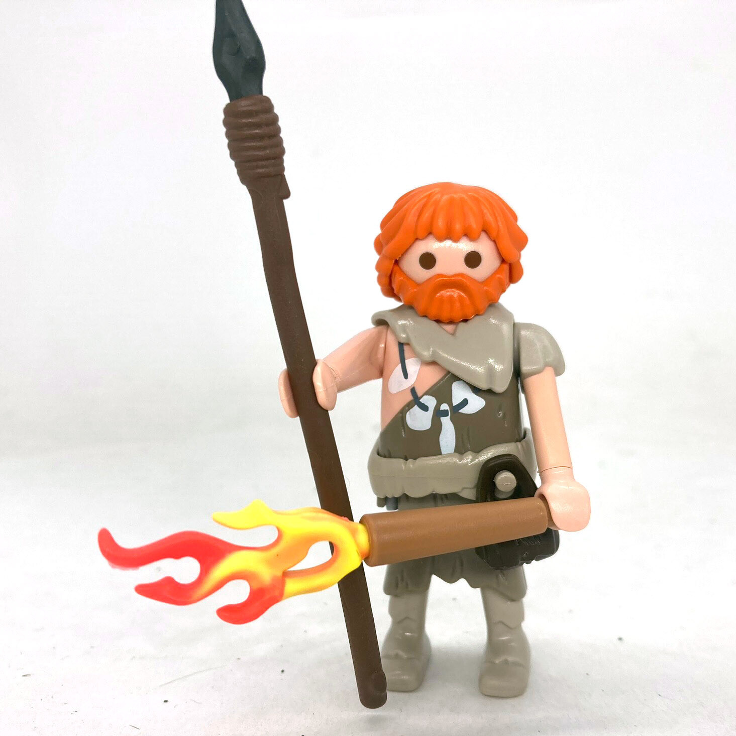Playmobil homme préhistorique torche