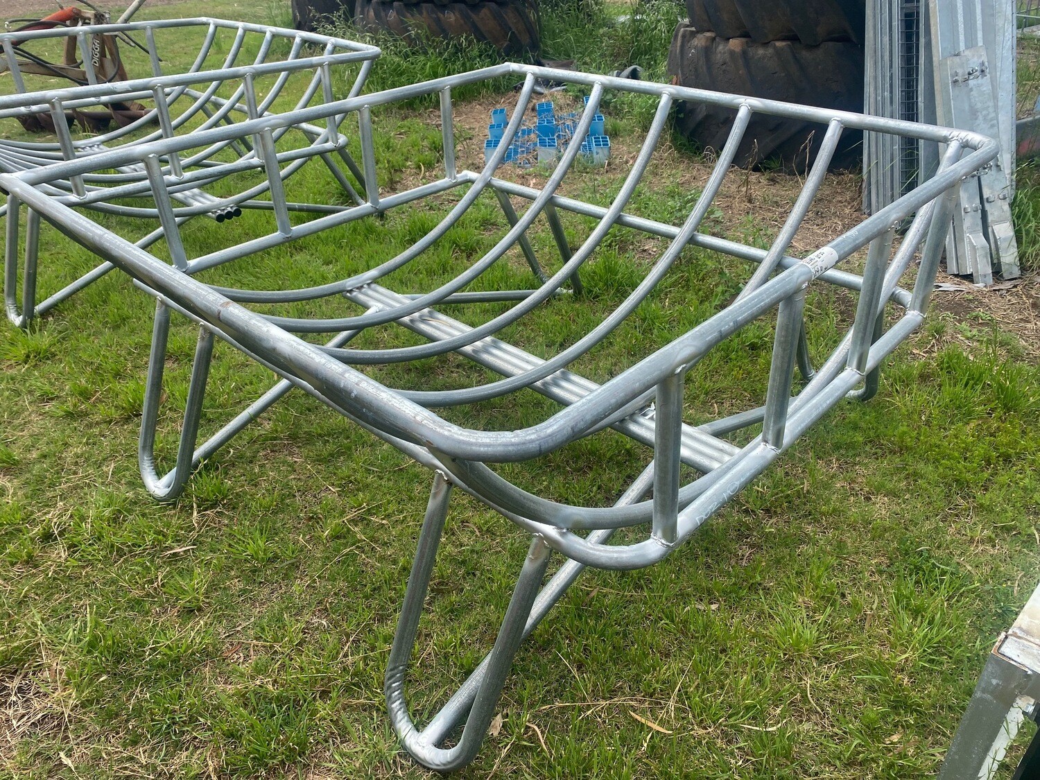 Hay livestock feeder cradle