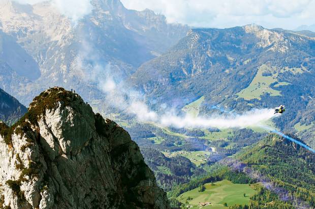 BASE Flying: BMW Unveils Motorized Wingsuit — and It's Electric ...