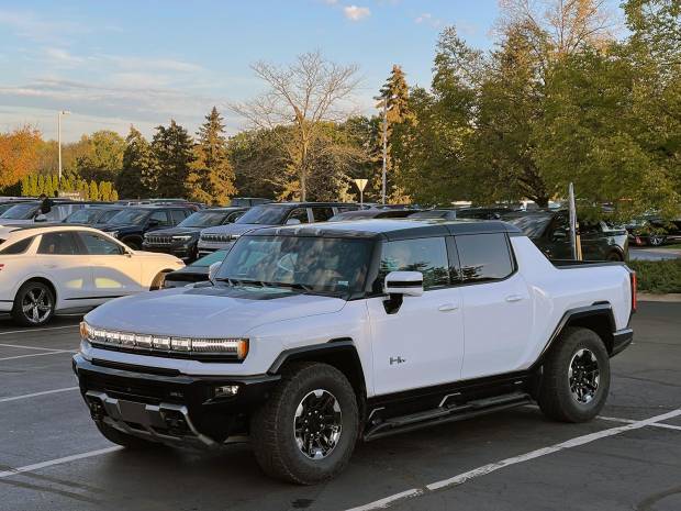 Electric Pickup Truck Showdown: Rivian R1T vs. GMC Hummer EV