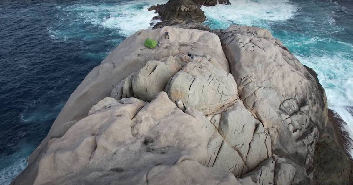 Watch a Lone Man Fish, Camp on Remote Rock Surrounded by Sea | GearJunkie