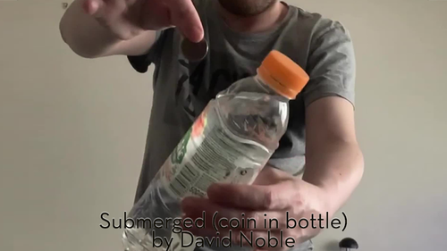 Submerged (coin in bottle) by David Noble DRM Protected Video Download