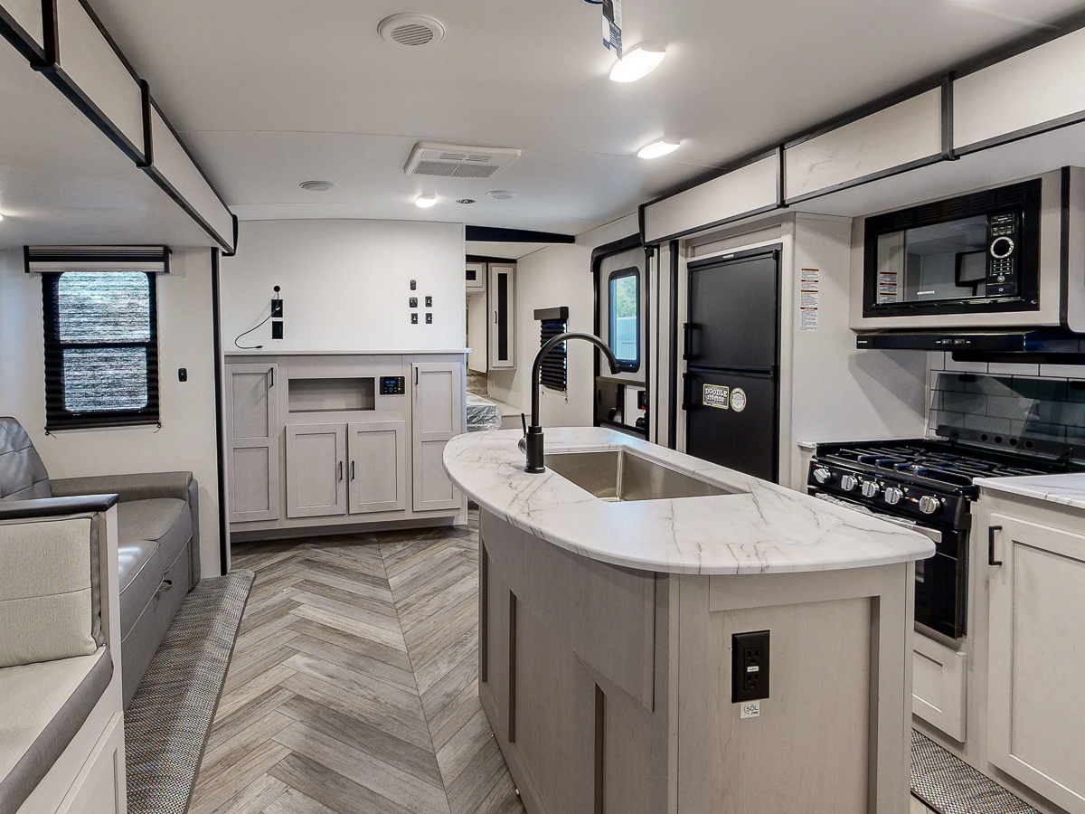 The Heartland Mallard M33 has an unloaded weight around 7,700 pounds and a GVWR of 9,600 pounds ...