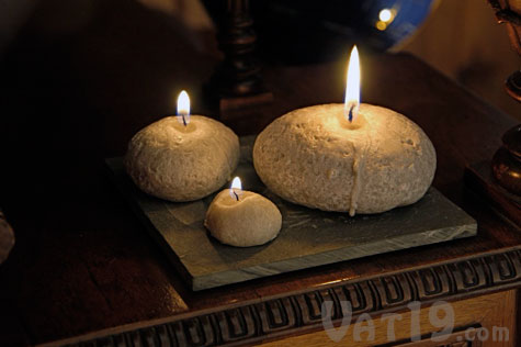 Create a rustic look inside with Pebble Candles.