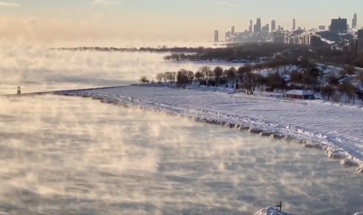 Brutally Cold Weather Causes Steam Fog to Rise Out of Lake Michigan