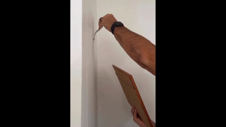 Man Shares Brilliant Hack For Hanging Pictures