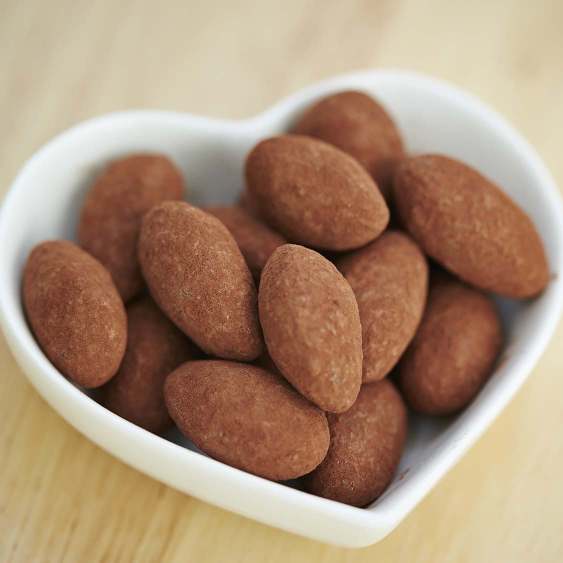 Cocoa Dusted Almonds with a Hint of Maple Syrup - recipe from MyNetDiary