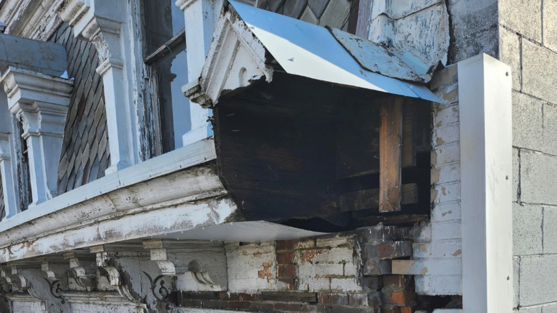 Historic Curtis Building faces condemnation following windstorm damage ...