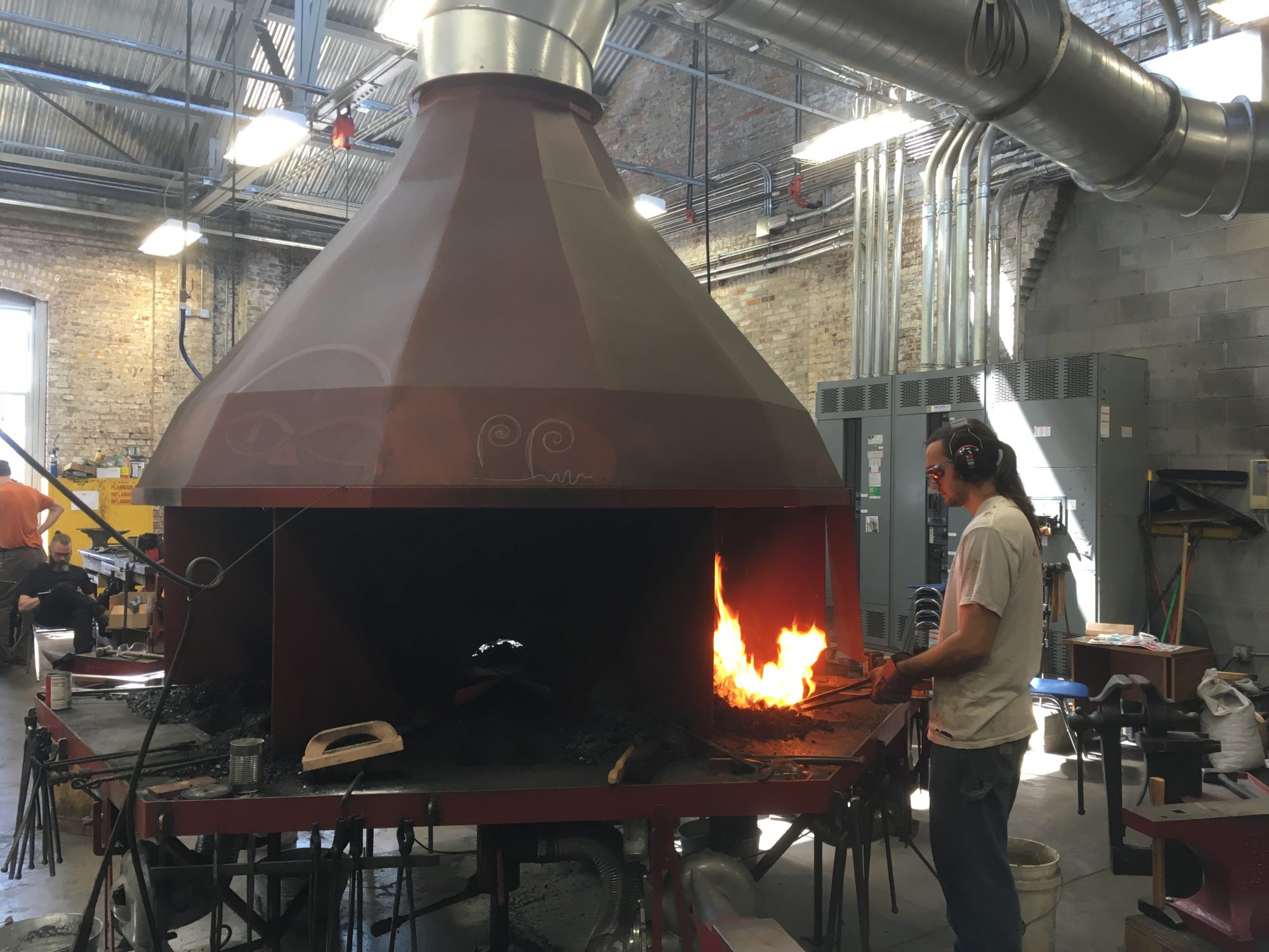 A new forge in the blacksmith shop was designed for efficiency. Six ...