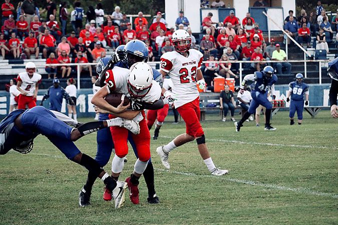 Red Devils beat Bulldogs in Fulton