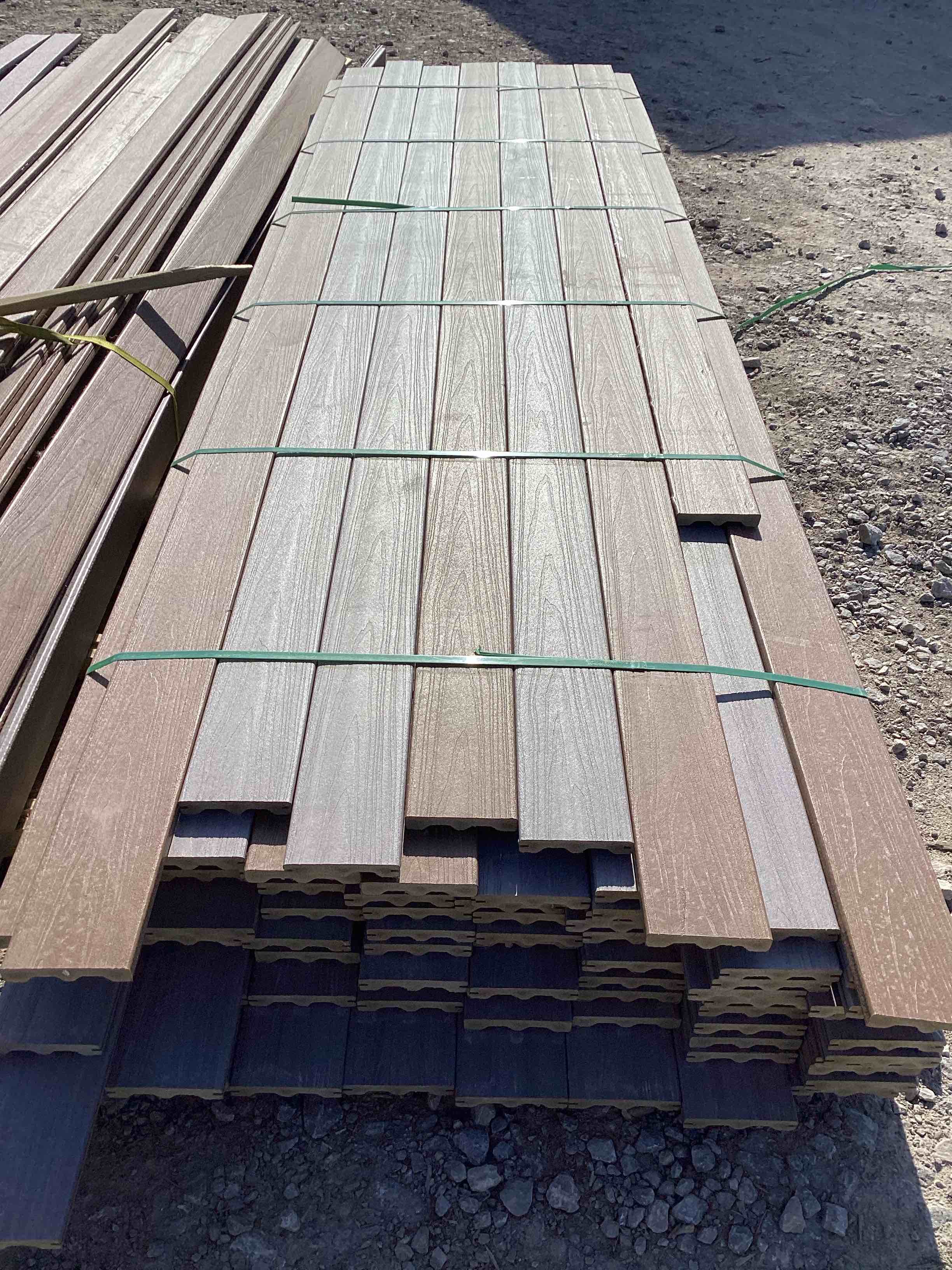 1,664 linear foot 88 pieces of brown and grey mixed grooved composite ...