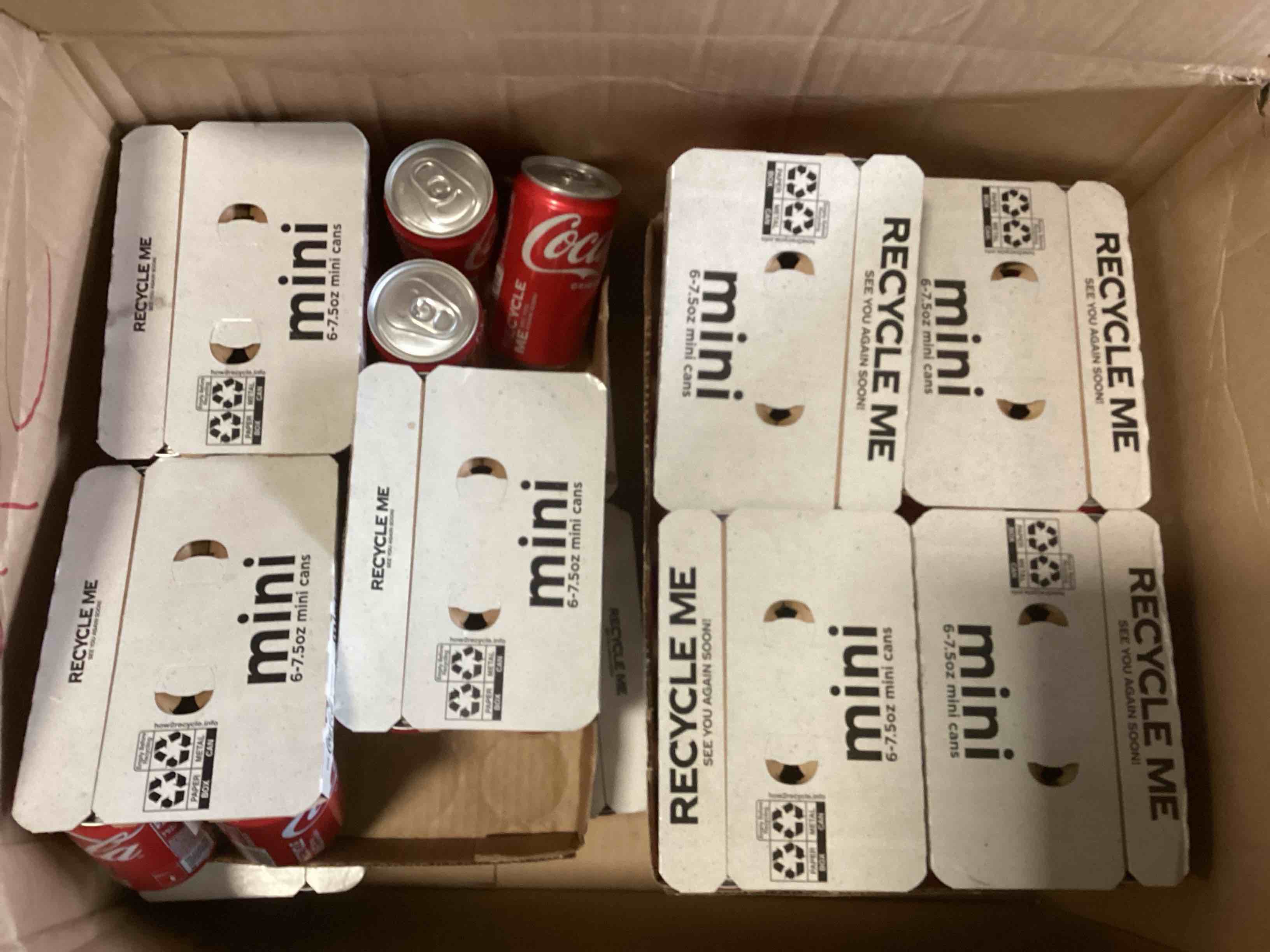 assorted mini Coca-Cola products, including Coke zeros Sprite and ...