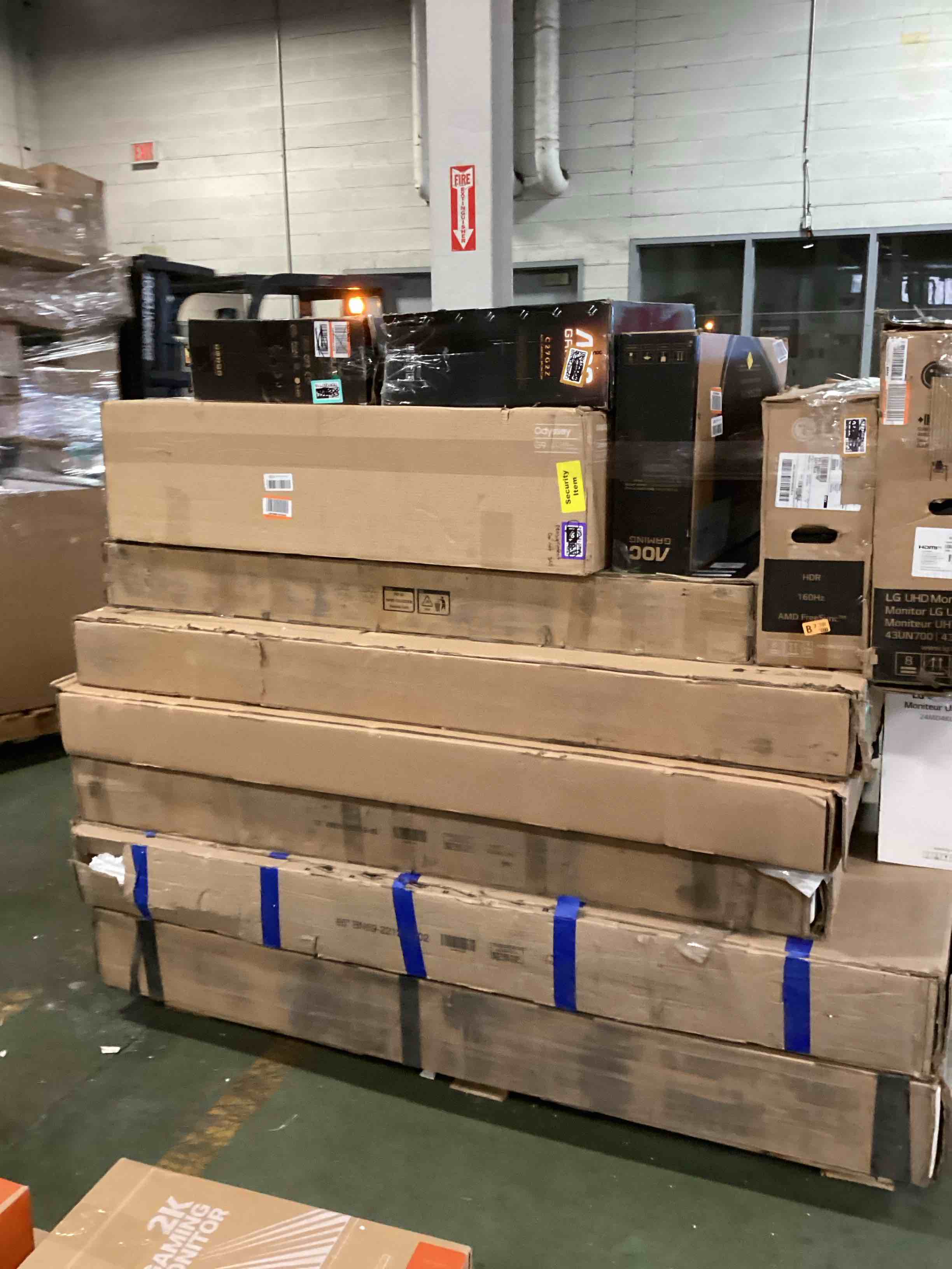 pallet of defective electronics for parts