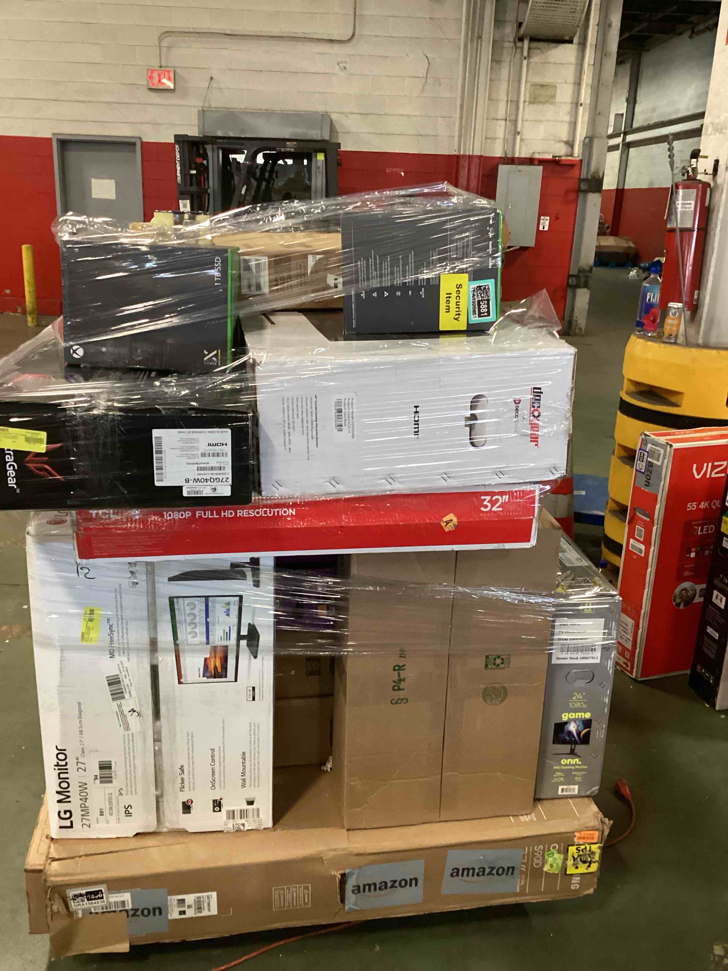pallet of defective electronics for parts