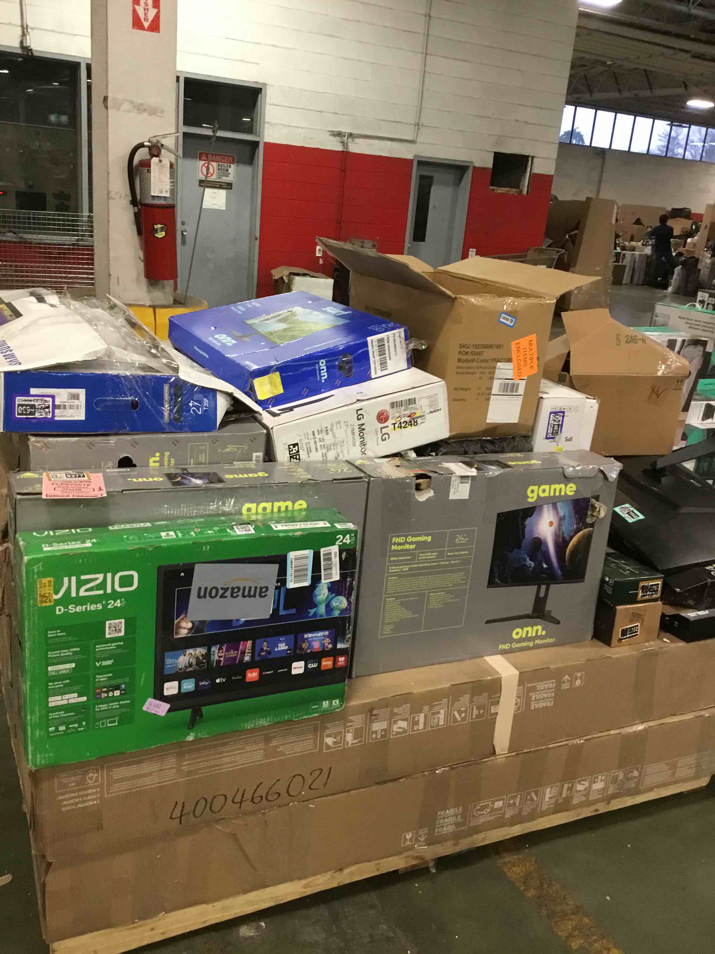 Pallet of Defective Electronics for parts (TV’s, monitors, smartwatches ...