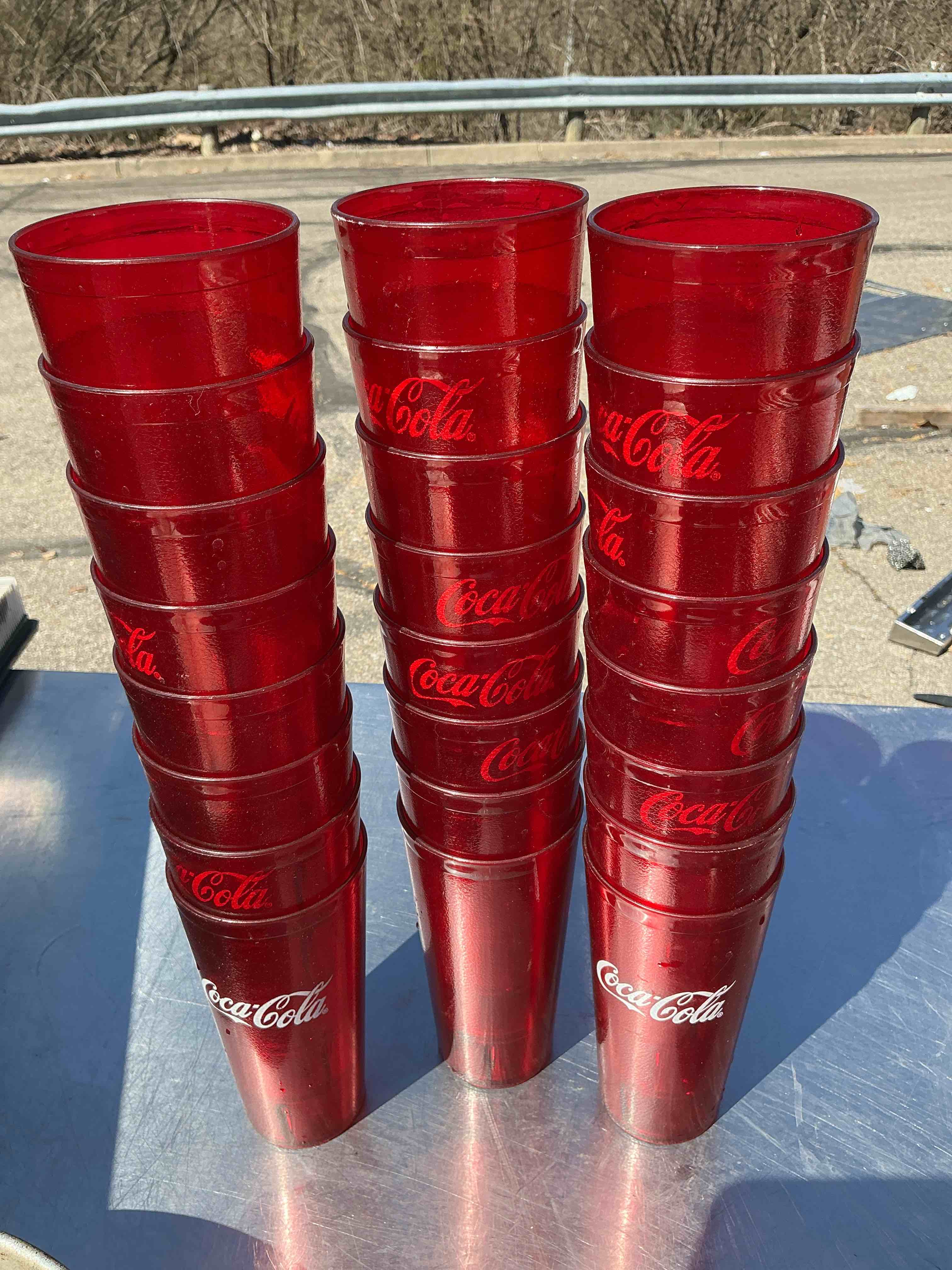 red plastic Coca Cola cups