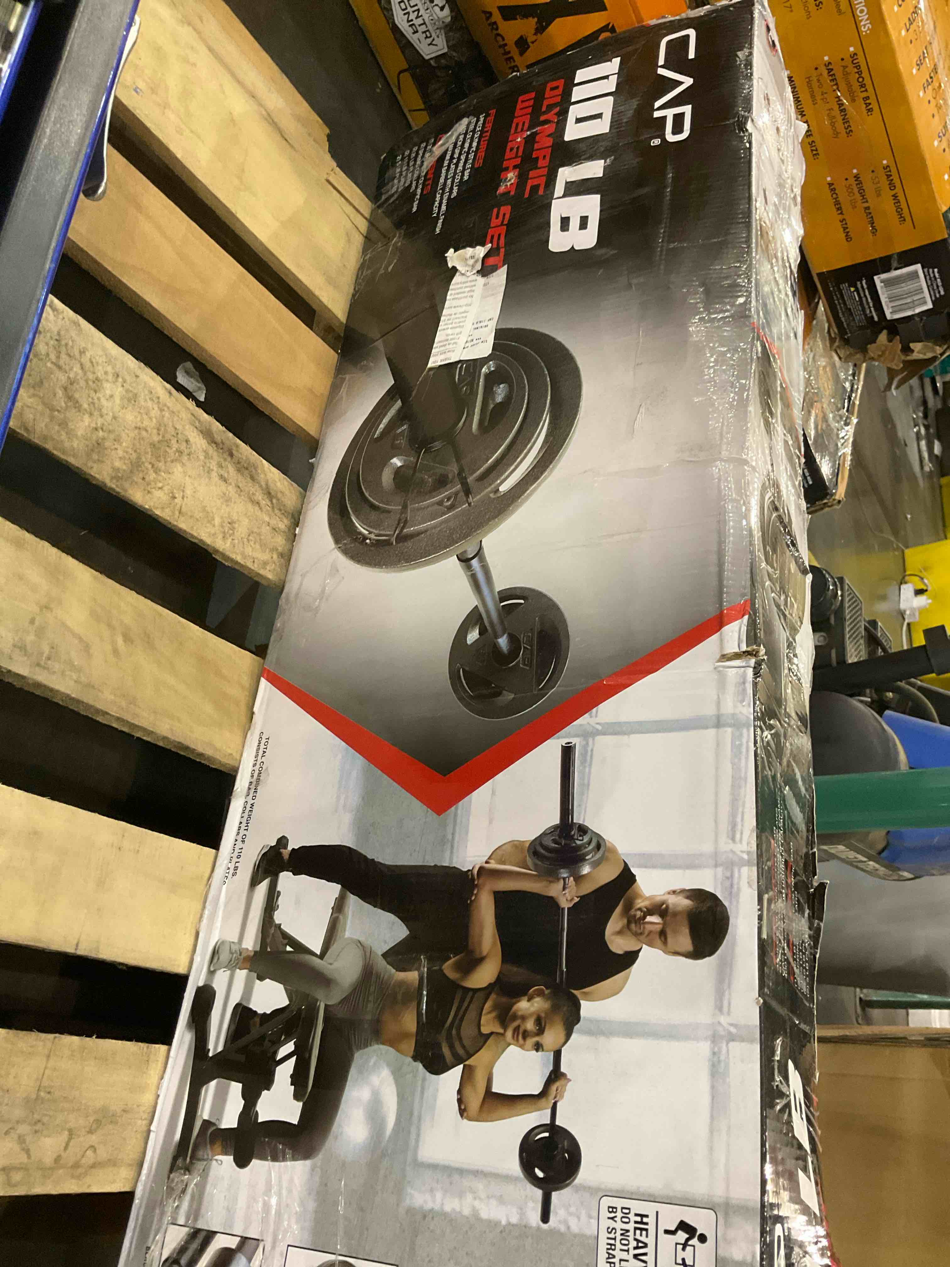 CAP. 110 LB OLYMPIC WEIGHT SET