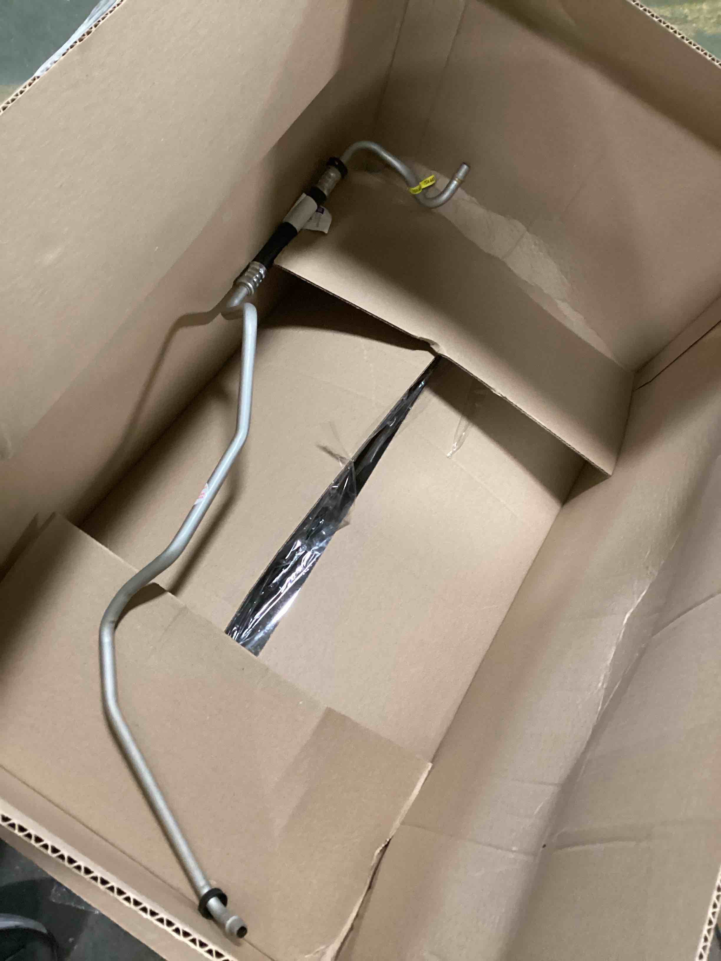 GM Genuine Parts 20977534 Automatic Transmission Fluid Cooler Lower Line