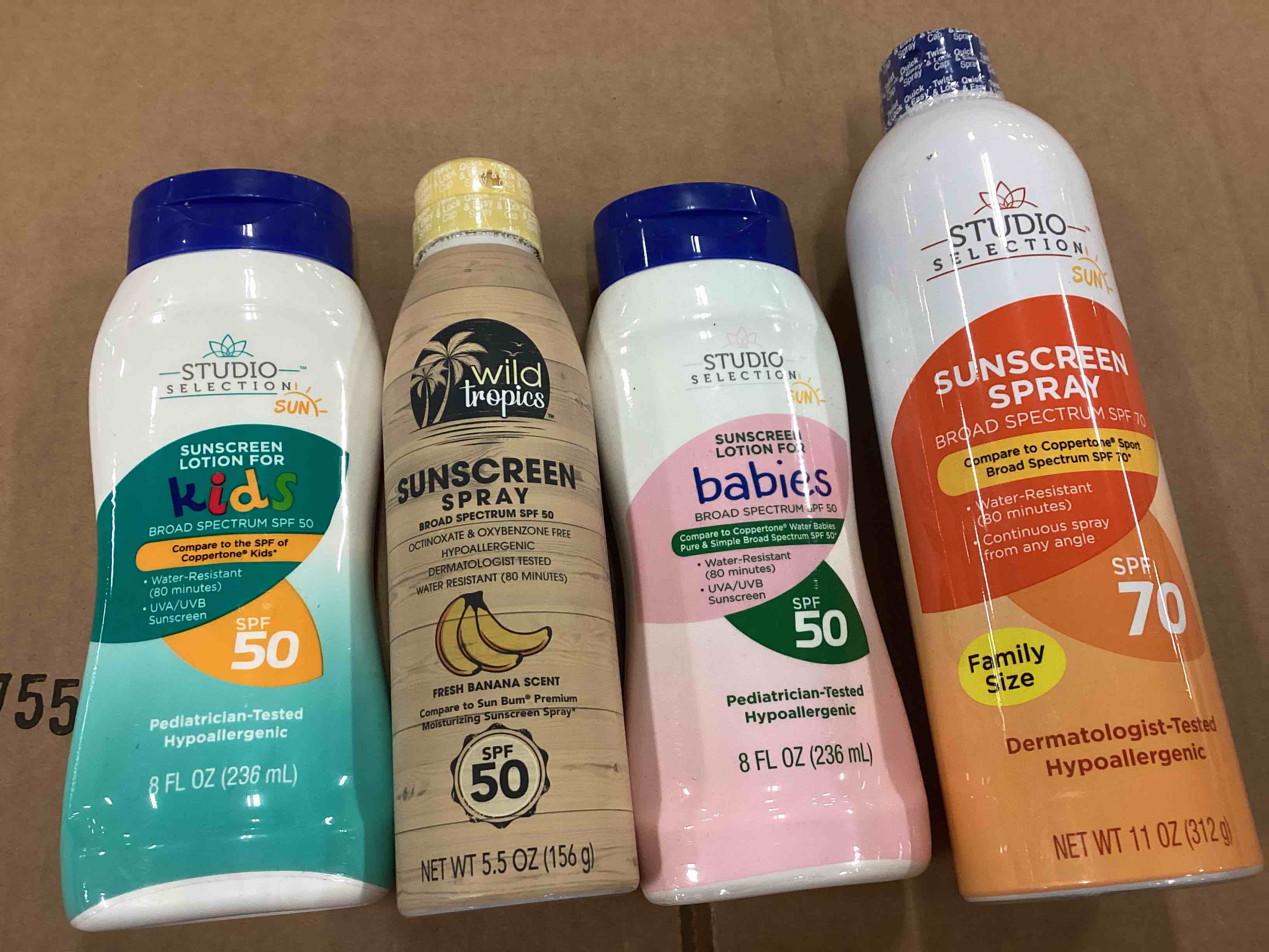 WILD TROPICS SUNSCREEN SPRAY, STUDIO SELECTION SUNSCREEN SPRAY AND LOCTION