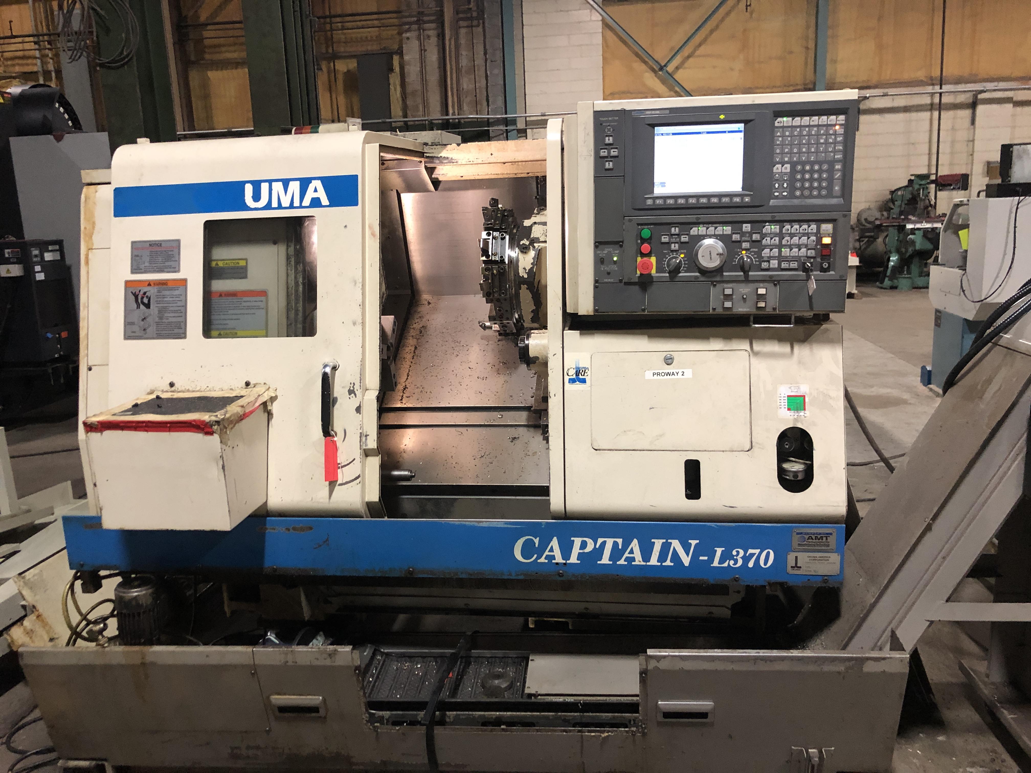 Okuma Captain L370BB CNC Lathe, OSP E100 Control, 10″ Chuck, 20.47 ...