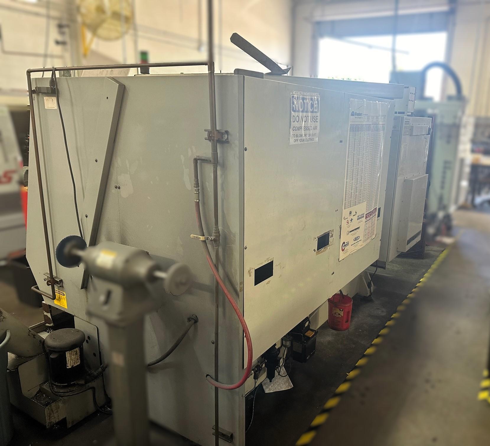 Haas HL-4 Lathe 1998 equipped with 10″ Chuck, Tooling, Chip Auger, Tool ...