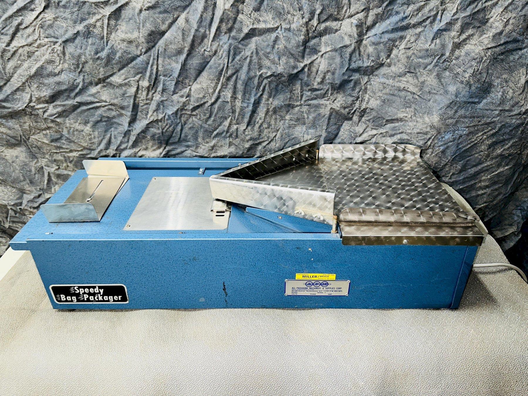 APM SBP-14 Speedy Bag Packager Semi-Automatic Bagger For Wicketed Bags ...