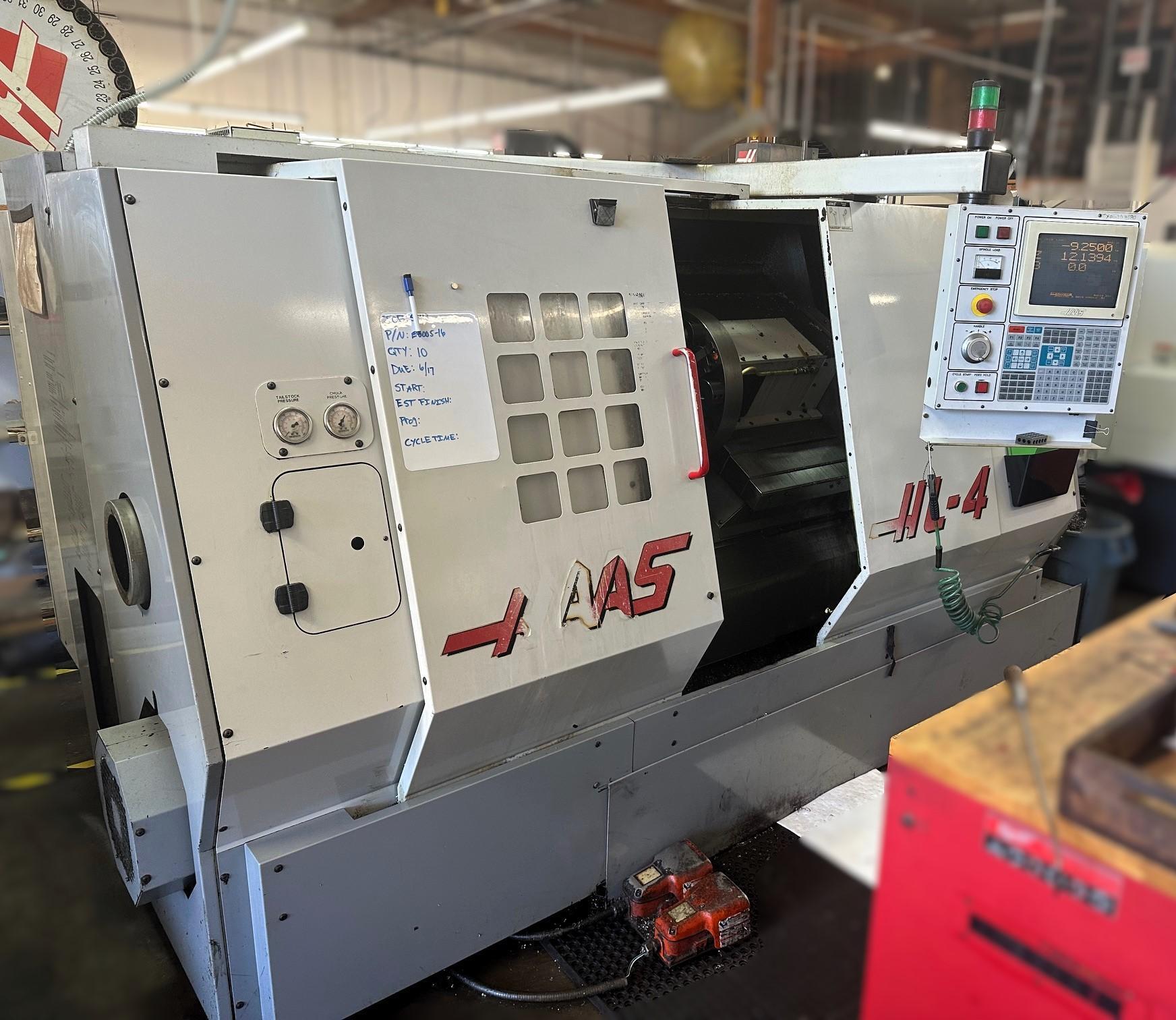 Haas HL-4 Lathe 1998 equipped with 10″ Chuck, Tooling, Chip Auger, Tool Pre-Setter, Tail Stock ...