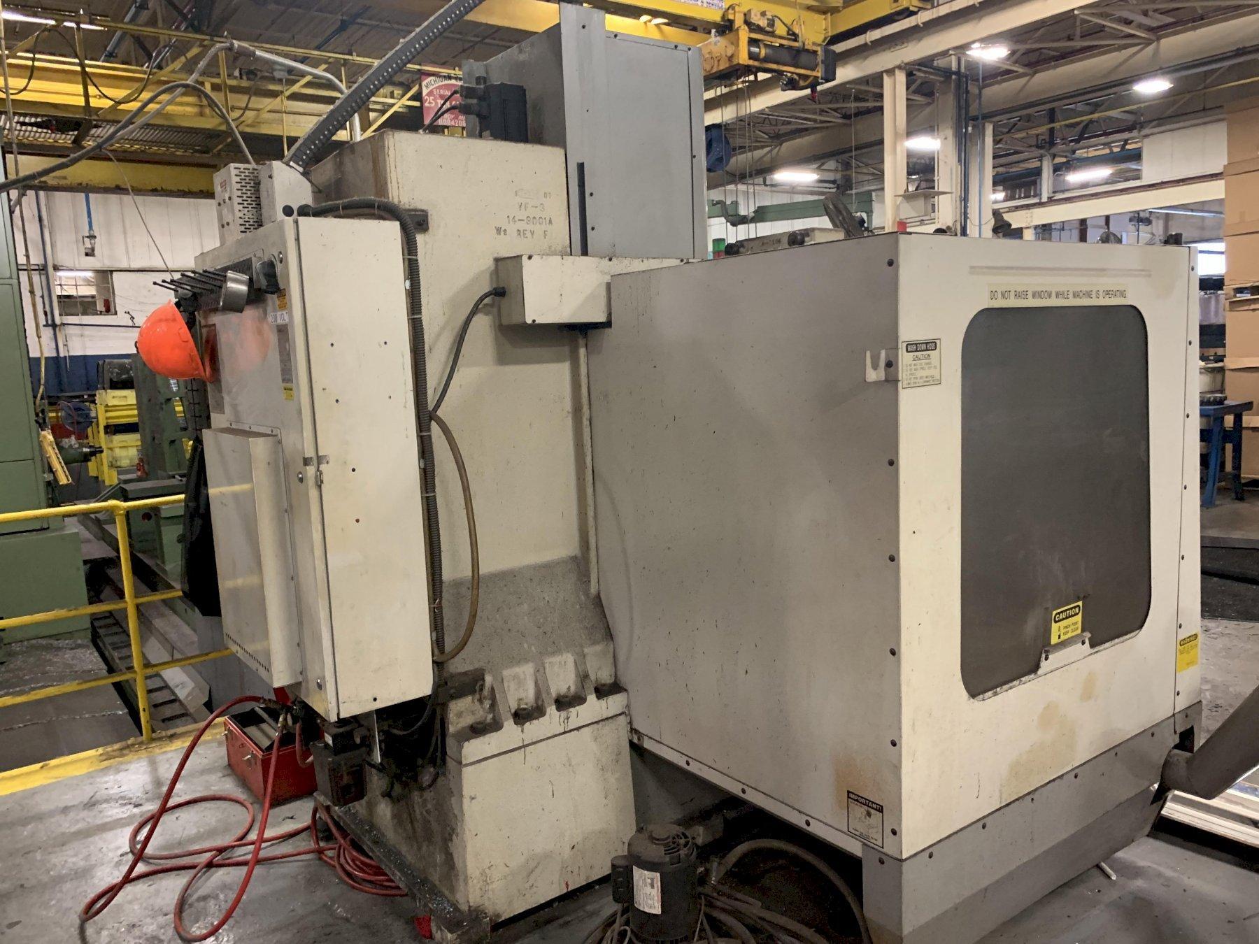 HAAS MODEL #VF4 VERTICAL MACHINING CENTER: STOCK 12216