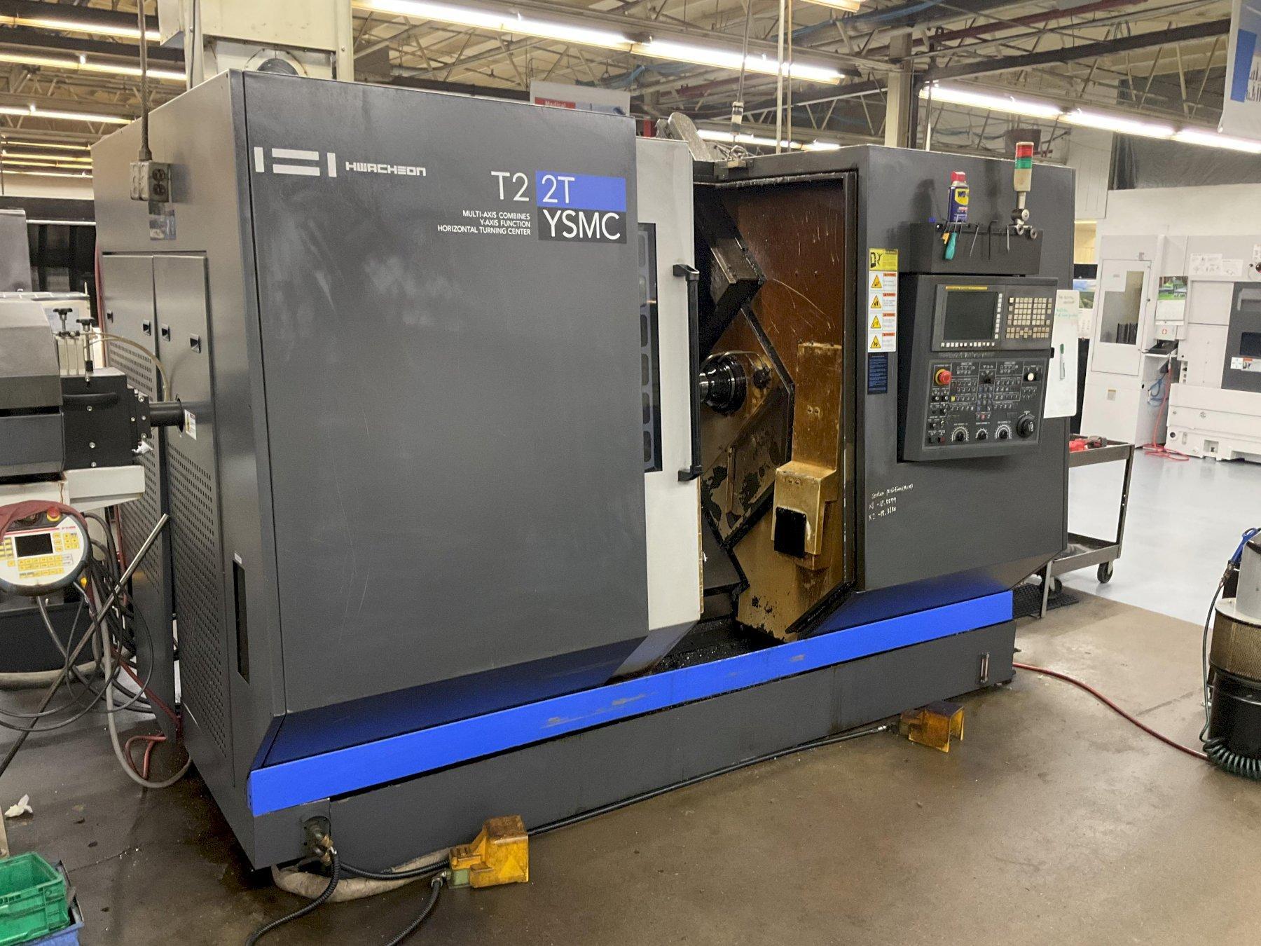 (2013) HWACHEON T2-2T-YSMC MULTI-AXIS CNC LATHE W/ FMB TURBO 5-55 BARFEEDER. STOCK # 0313023 | G ...