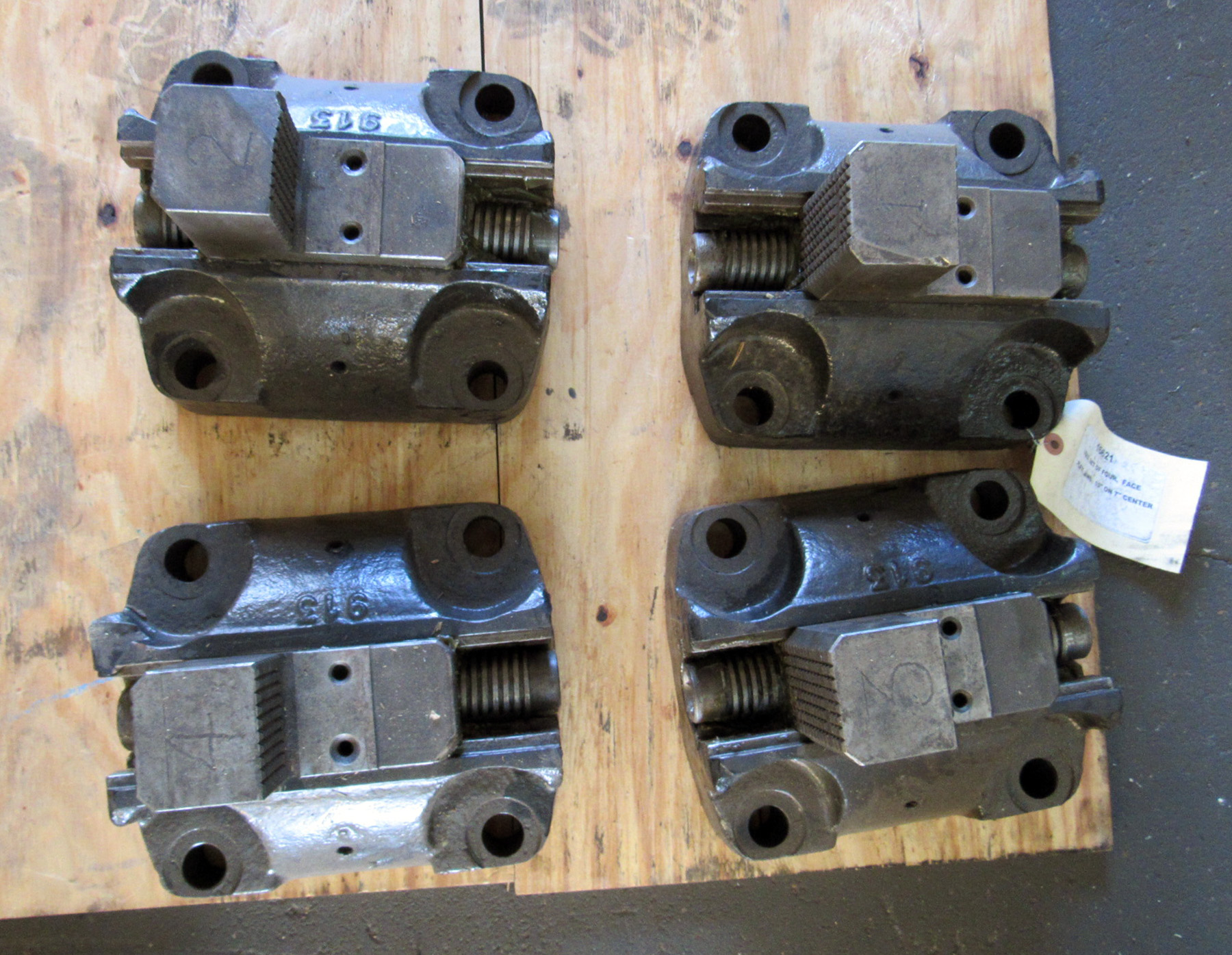 USED, SET OF FOUR FACE PLATE JAWS, 10″ ON 7″ CENTERS | Harris Machine Tools