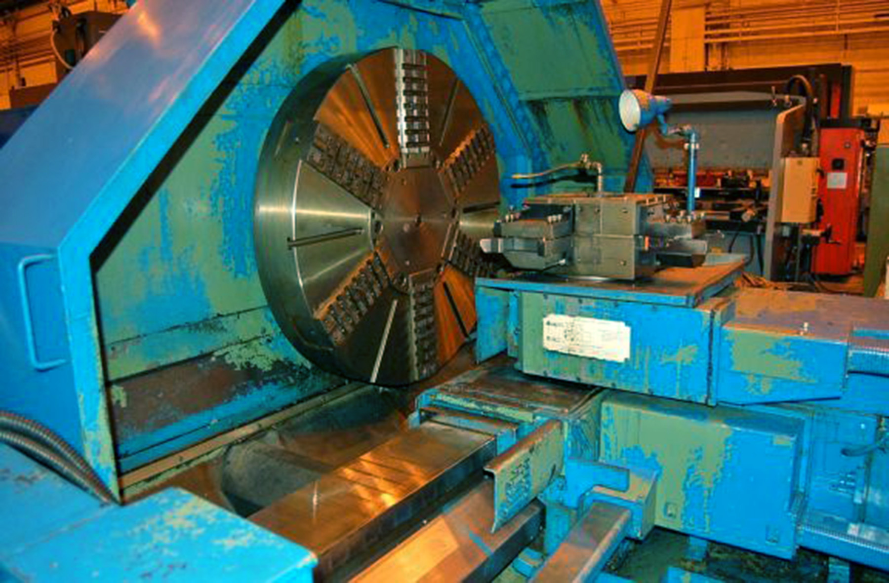 USED, 60″ OKUMA CNC T-LATHE WITH 13″ SPINDLE BORE | Harris Machine Tools