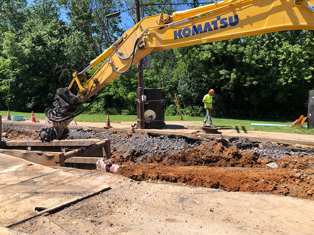 AQ-4XL Drum Cutter on PC490 Trenching Limestone in Pennsylvania