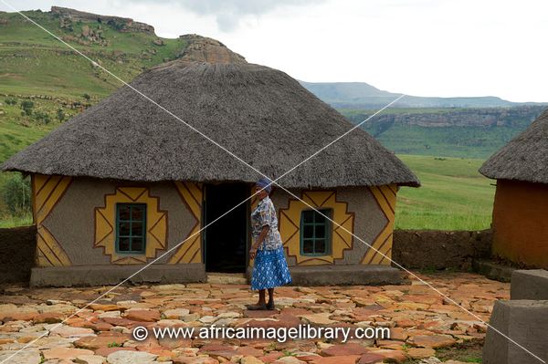 Photos and pictures of: Sotho woman in front of hut, Basotho Cultural ...