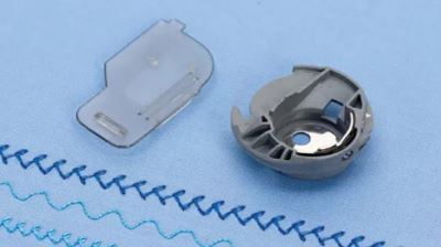 how does a bobbin case work