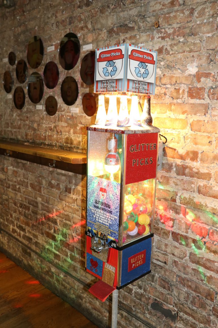 Local guitar pick vending machine business donates a share of profits ...