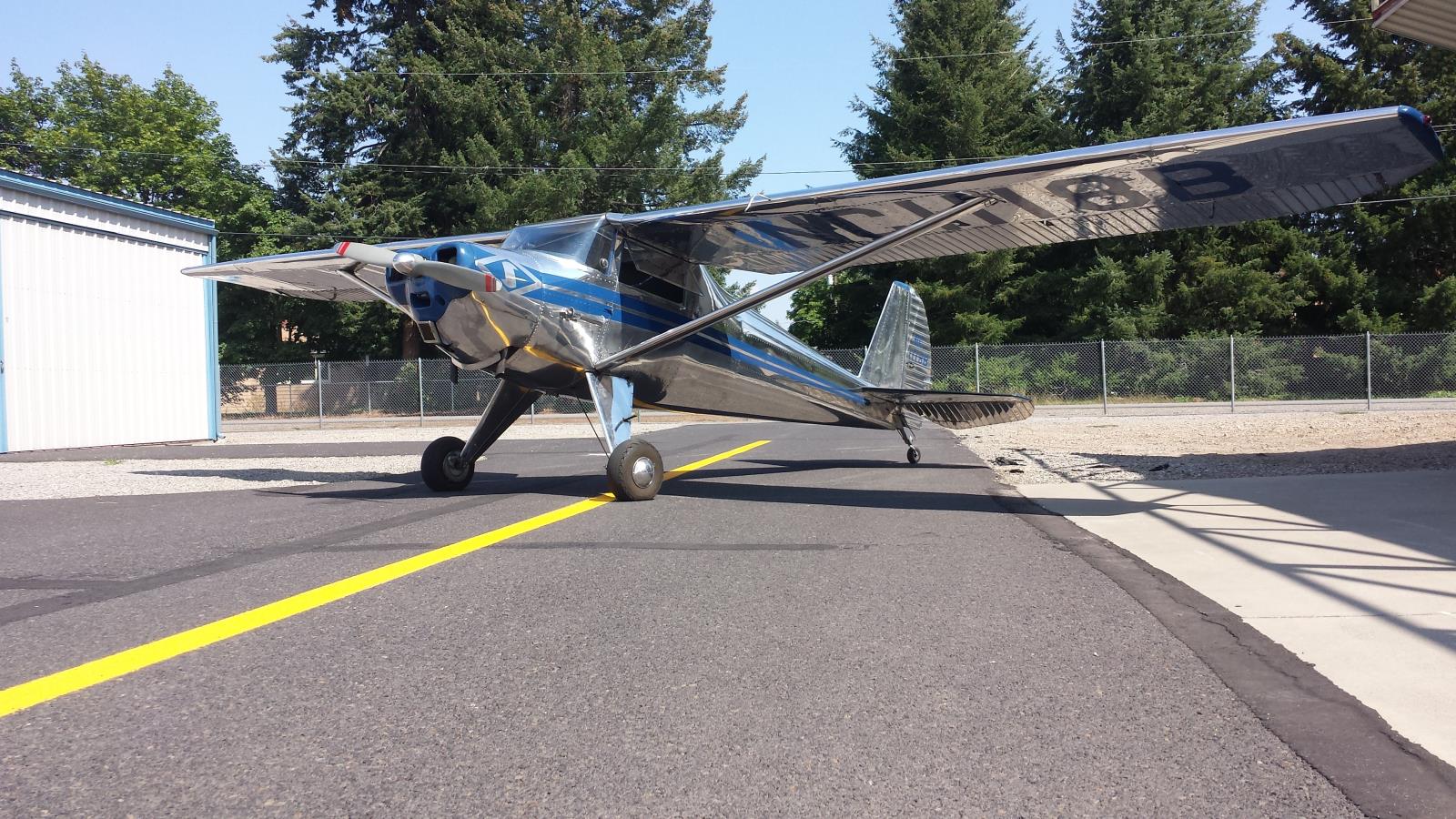 KPUW KSFF: Cross country KPUW KSFF. 1 go around, 1 wheel landing