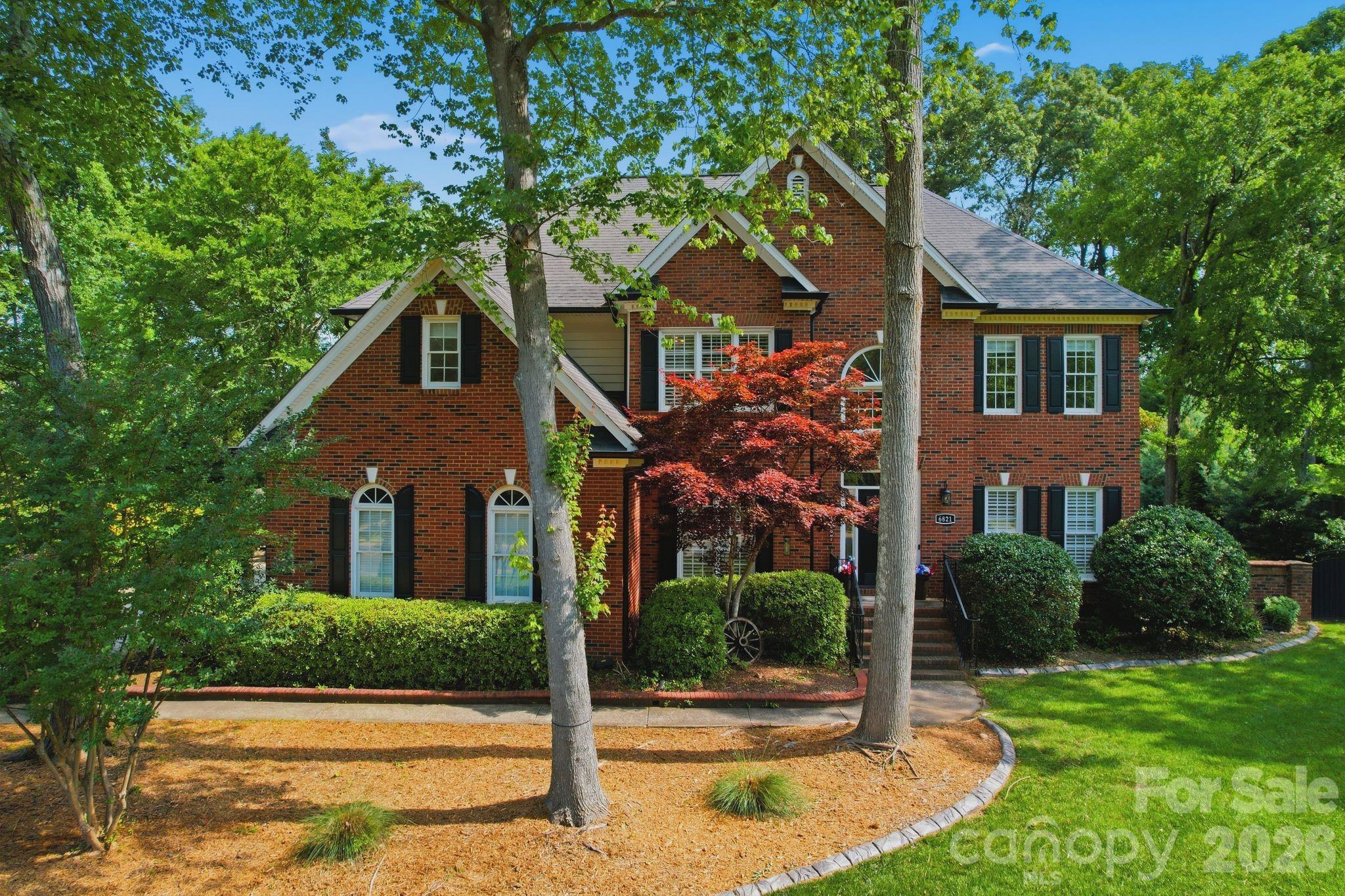Home for sale at 6821 Hollow Oak Drive, Charlotte, NC — photo 1 of 38