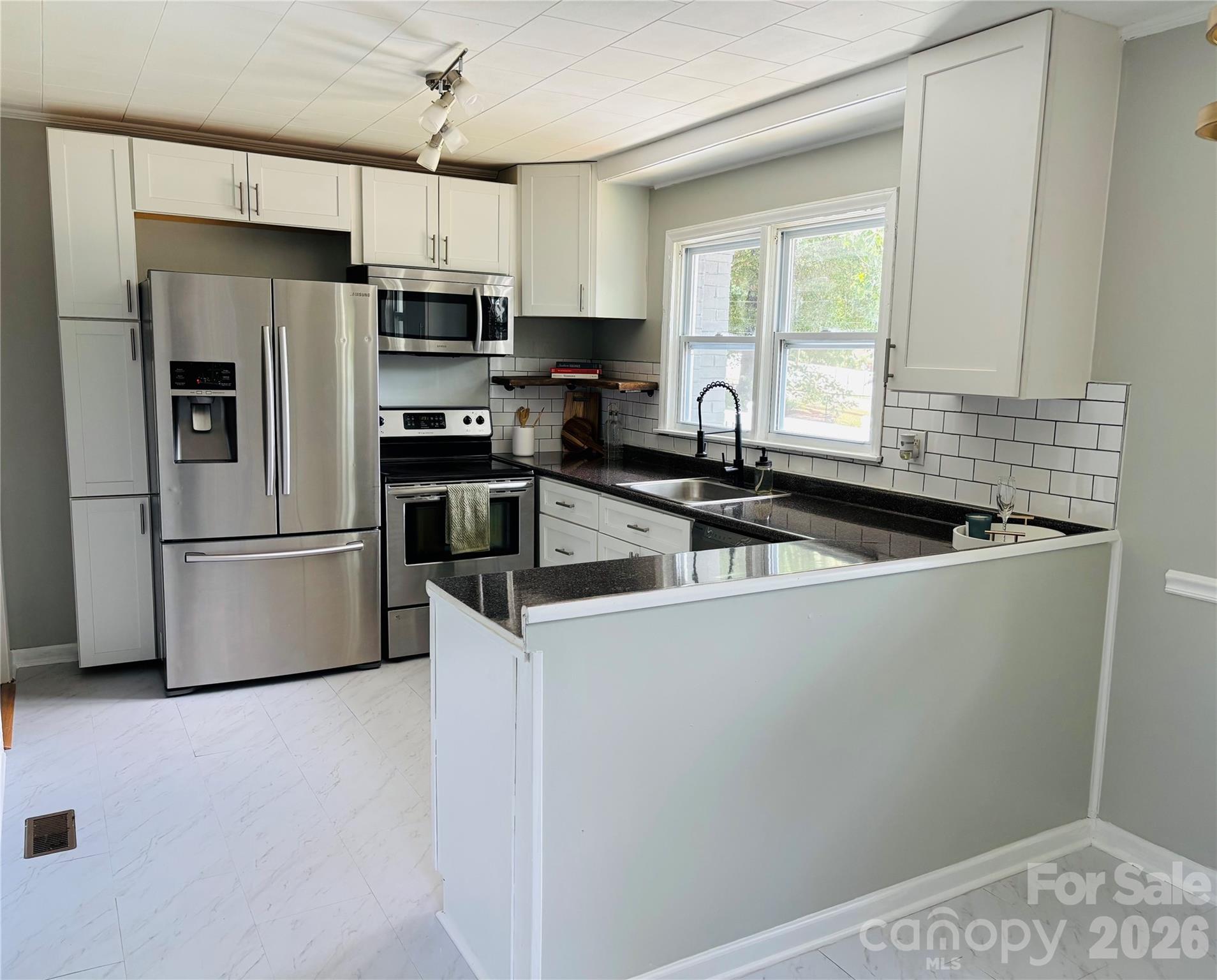 Photo 3 of 305 Forestway Drive, Mount Holly, NC