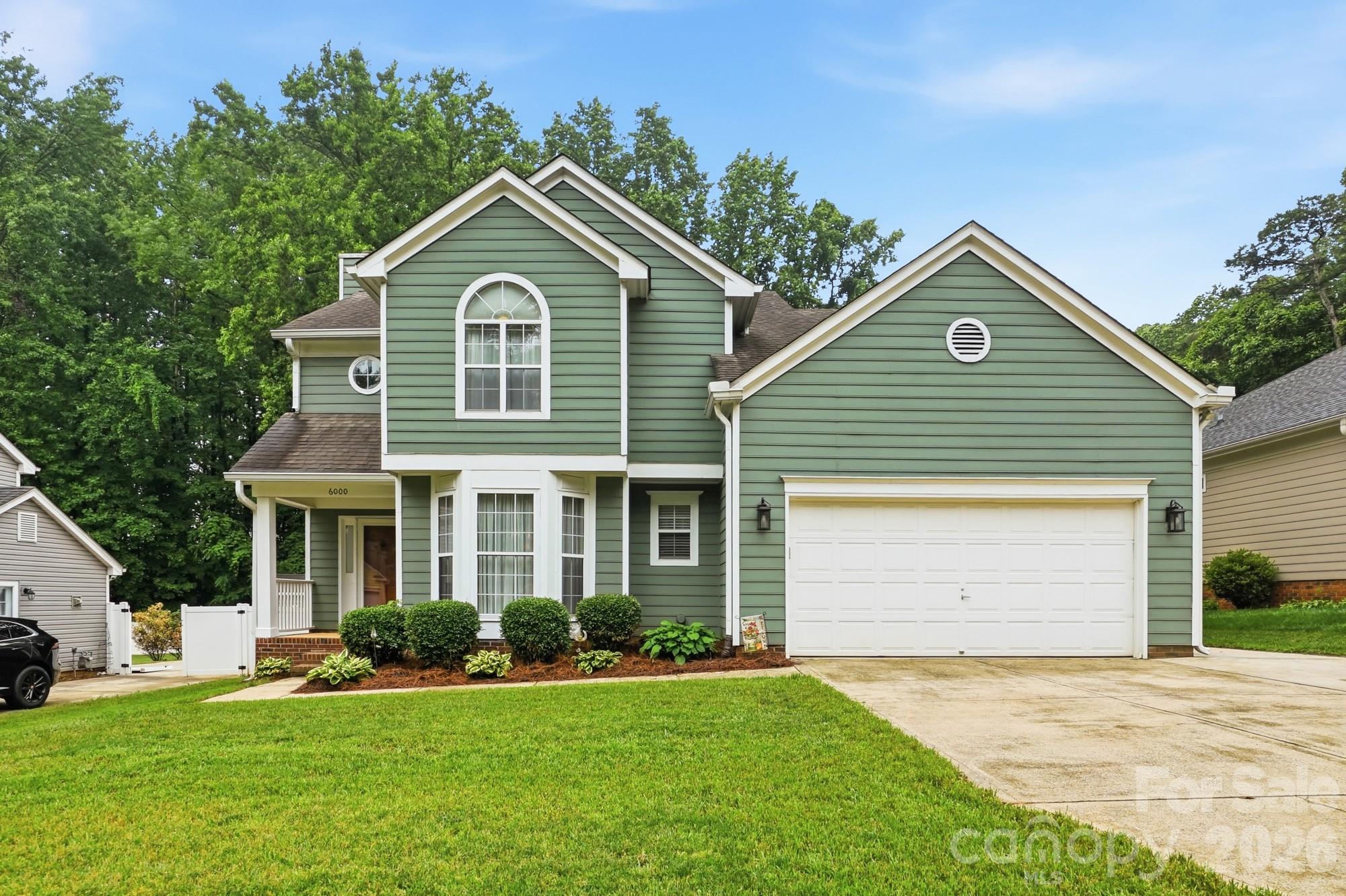 Home for sale at 6000 Carriage Oaks Drive, Charlotte, NC — photo 1 of 42