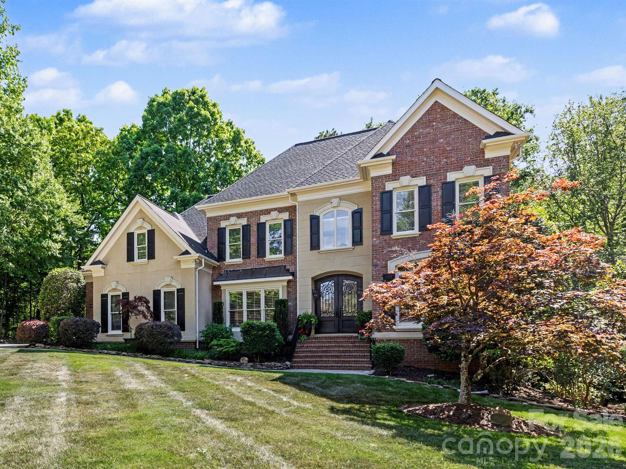 Home for sale at 9341 Whispering Wind Drive, Charlotte, NC — photo 1 of 48